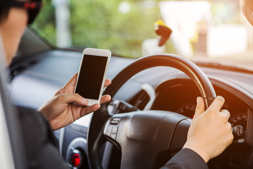 Mobile Phone Use While Driving – Statistics, Research and the Law